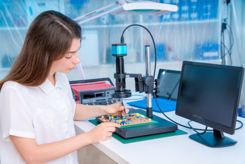 Young Woman in Inspection Electronics PCB Devise. Modern Electronics ...