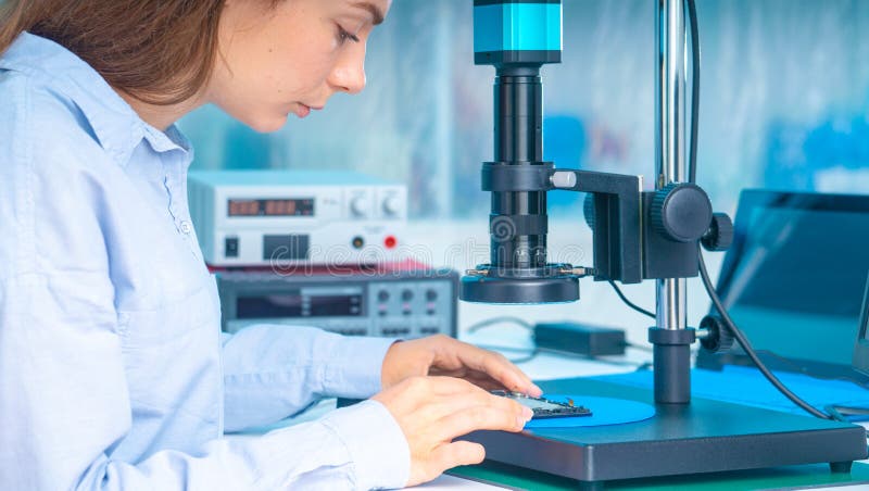 Young Woman in Inspection Electronics PCB Devise. Modern Electronics ...