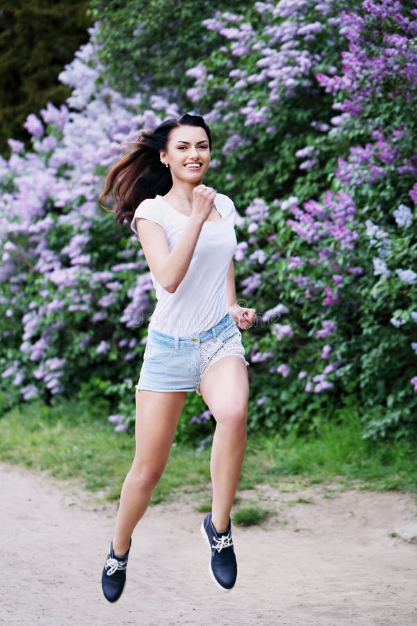 Young woman jogging stock image. Image of beauty, marathon - 73552843
