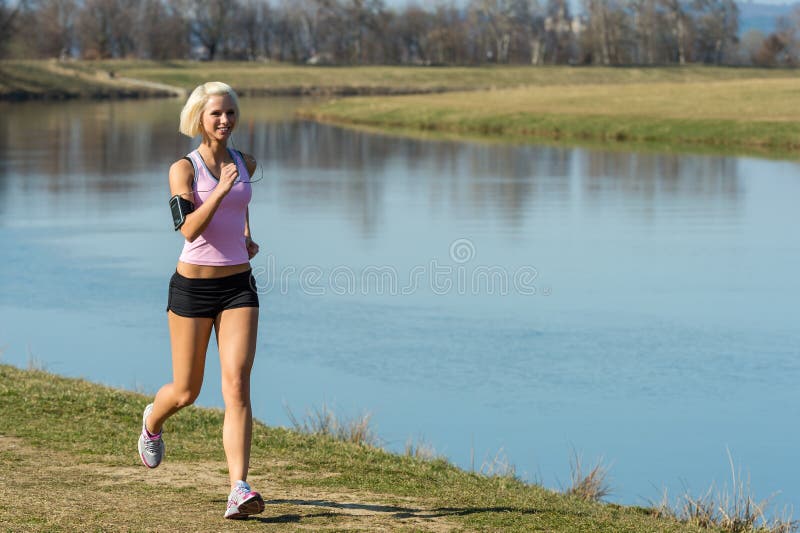 Jogging by the water stock photo. Image of male, lone, running - 260462