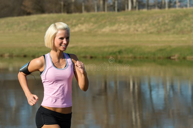 Jogging by the water stock photo. Image of male, lone, running - 260462