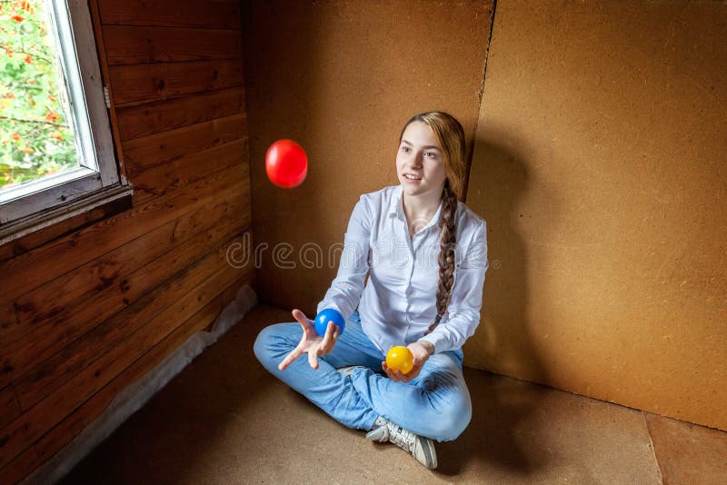 Young woman juggling stock photo. Image of female, gesturing - 102767730