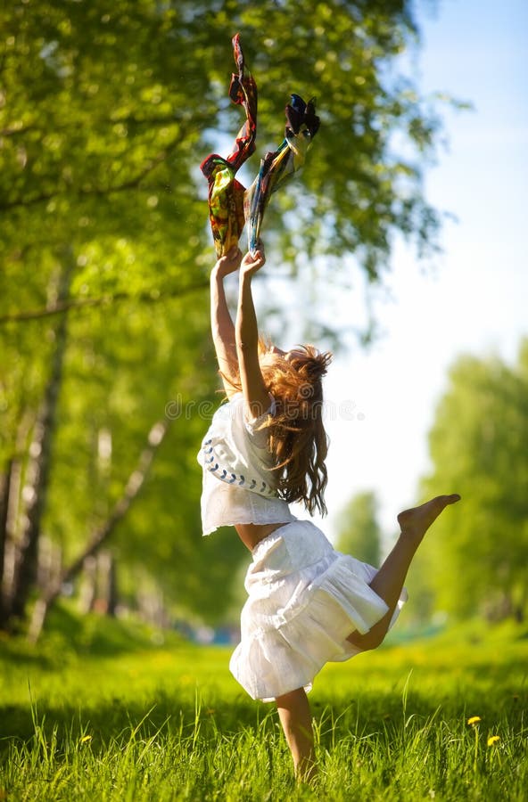 Young woman jumping stock image. Image of grass, nature - 10434401