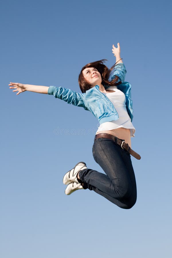 Young woman jumping stock photo. Image of springtime - 21767456