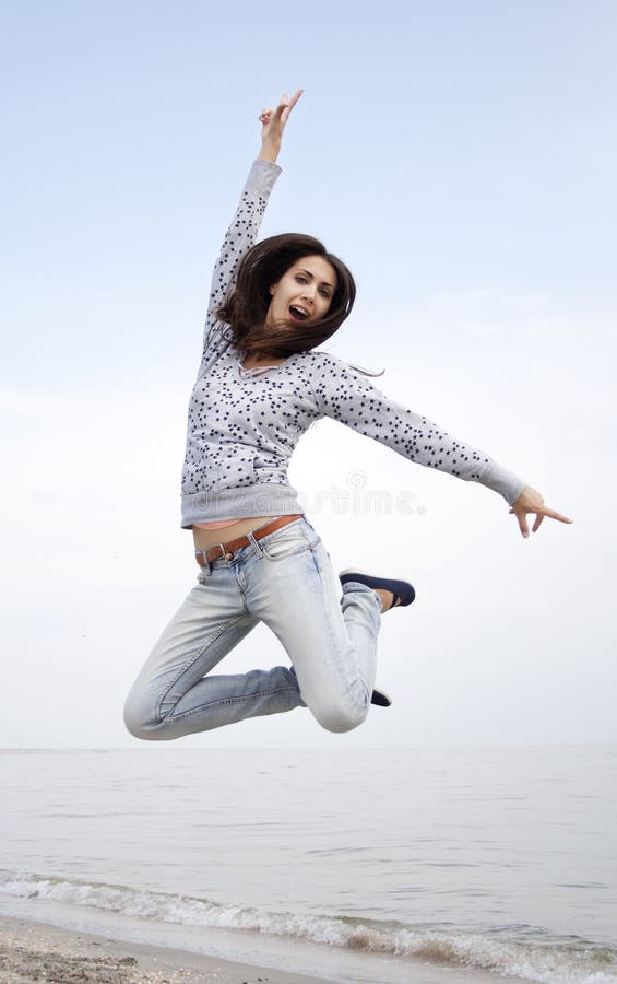 Young woman jumping stock photo. Image of lifestyle, healthy - 22662608