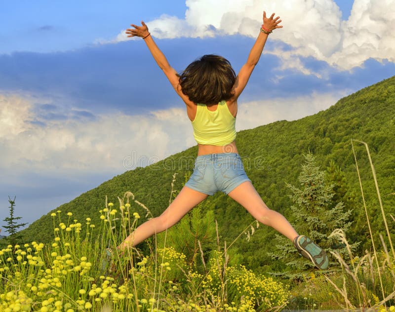 Young Woman Jumping High in the Mountains Stock Image - Image of health ...