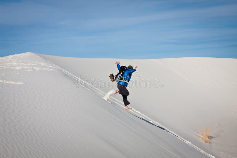 Young Woman Jumping in the Sand Stock Photo - Image of young, girl ...