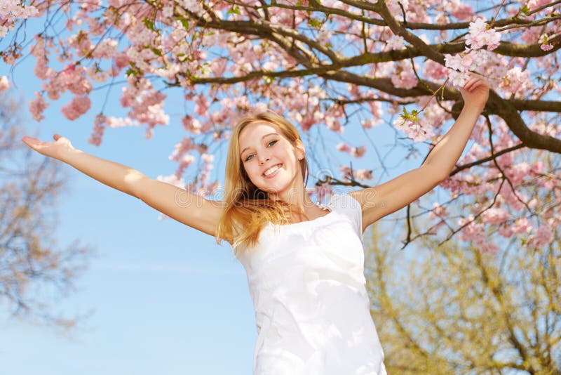 Young Woman Jumping in Spring Stock Photo - Image of blond, freshness ...