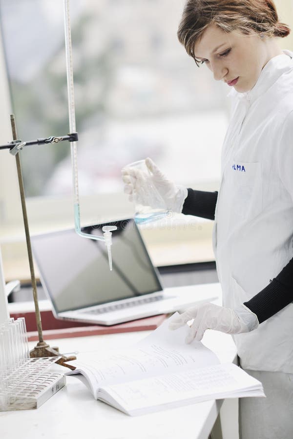 Young woman in lab stock image. Image of expertise, discovery - 14008835
