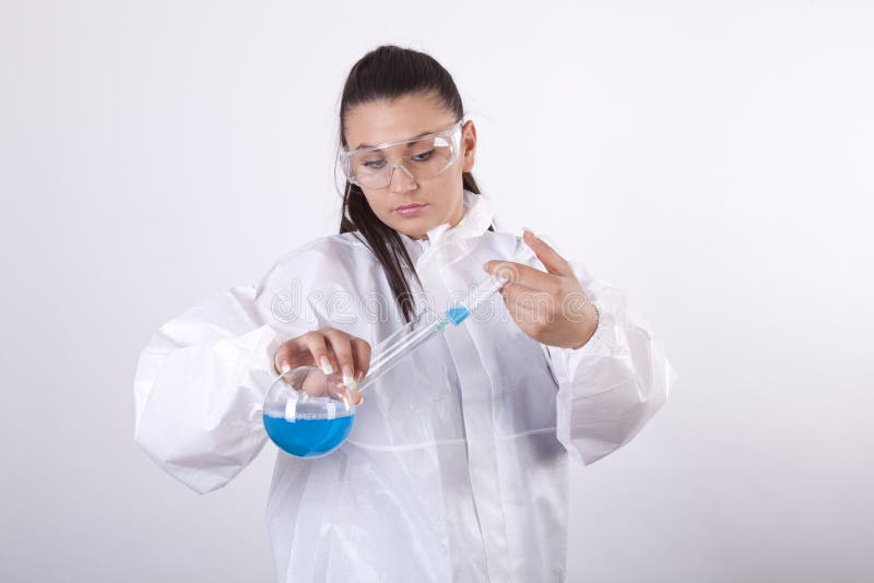 Young Woman Lab Technician Holding a Test Tube Stock Photo - Image of ...