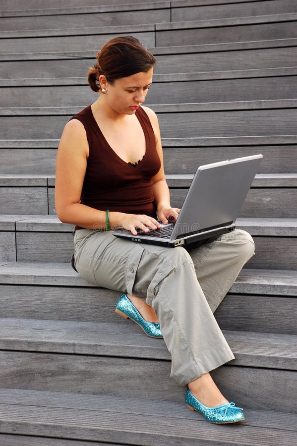 Young Woman with a Laptop Computer Stock Image - Image of female, urban ...