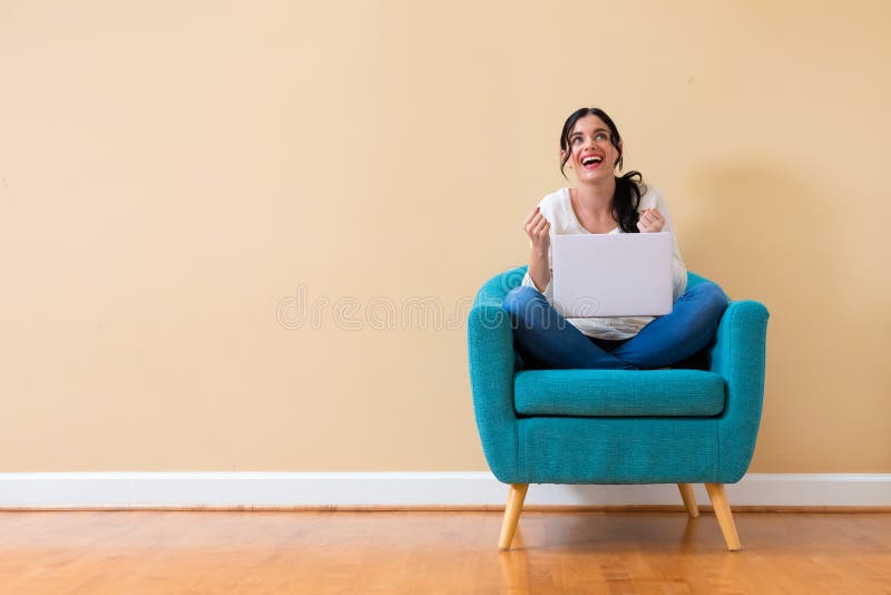 Young Woman with a Laptop Computer with Successful Pose Stock Photo ...