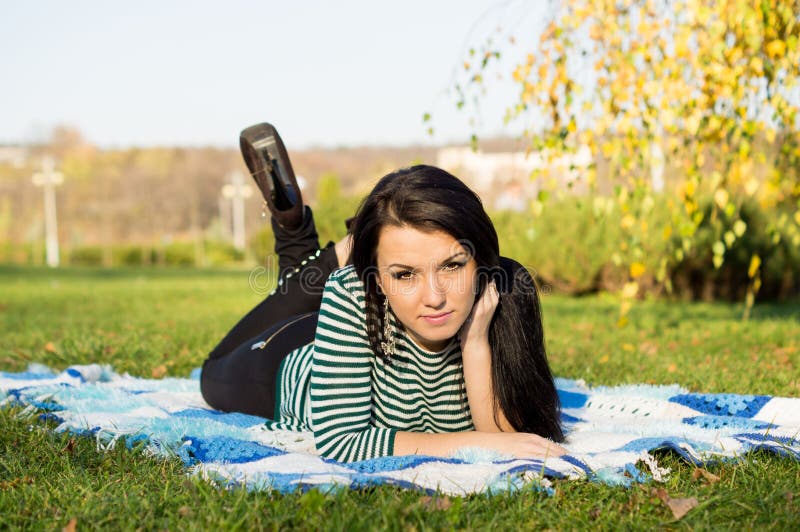 Young Woman Laying Down On The Ground In Autumn Stock Image Image Of