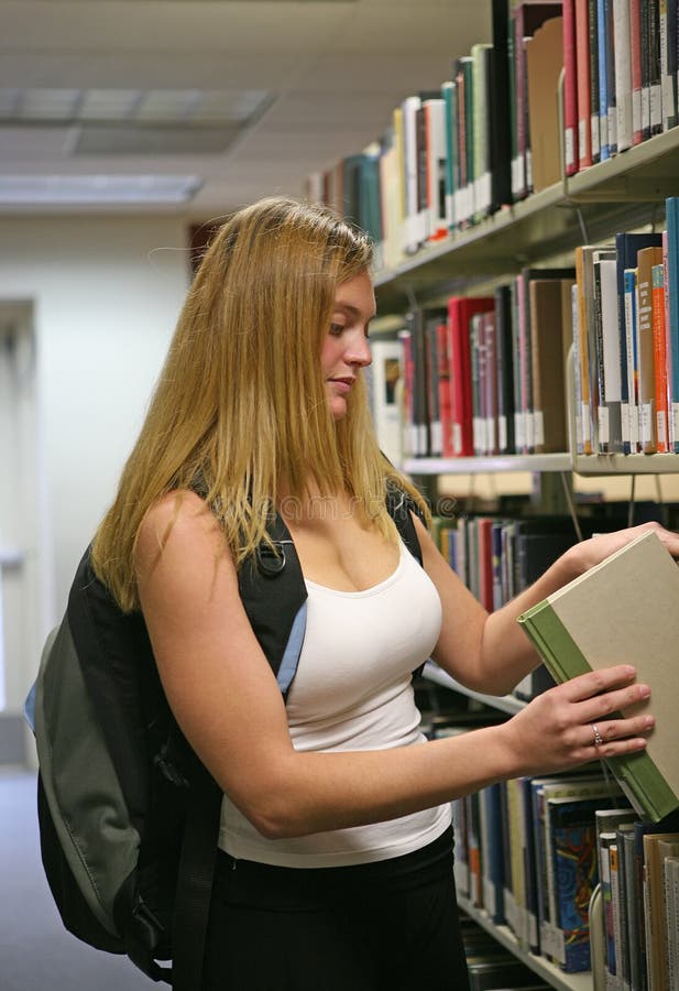 Woman in Library stock photo. Image of education, inside - 1370746