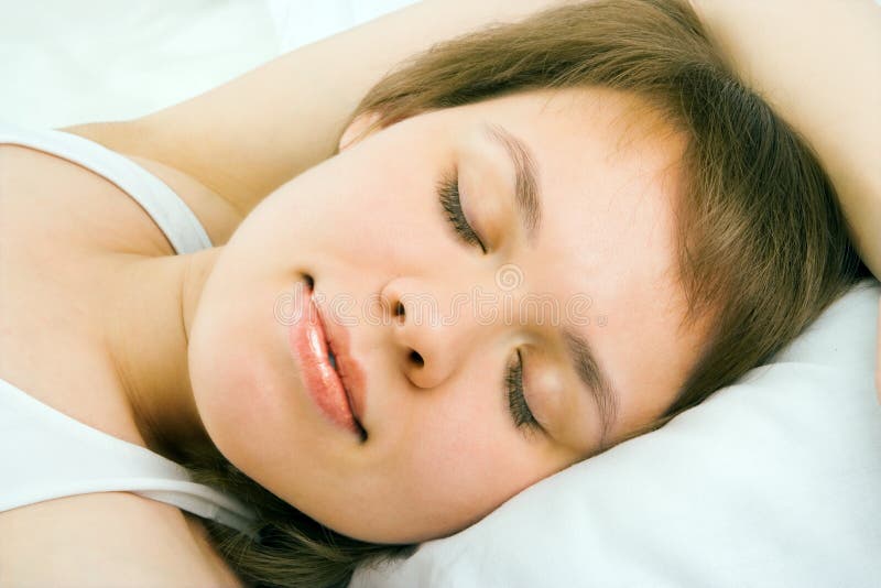 Young woman lie in bed stock image. Image of playful, relaxing - 4193485