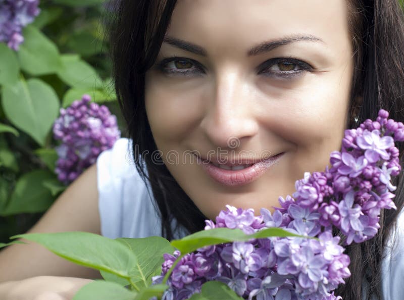 Young Woman with Lilac Flower Stock Image - Image of lila, light: 29334689