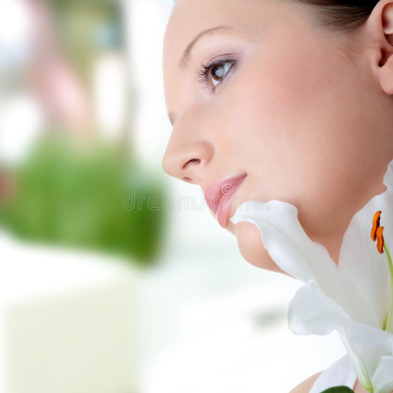 Young woman with lily stock photo. Image of fashion, adult - 13580774