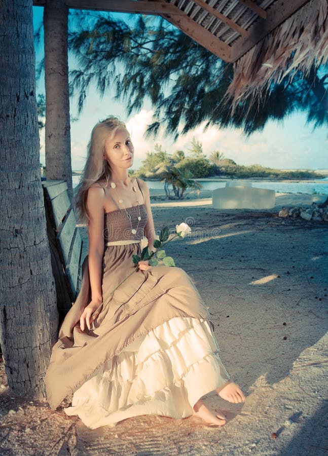 The Young Woman in a Long Sundress on a Tropical Beach. ,with a Retro ...