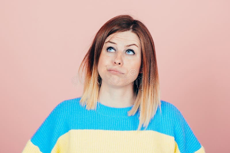 Young Woman Looking Above As she is in Doubt Stock Image - Image of ...