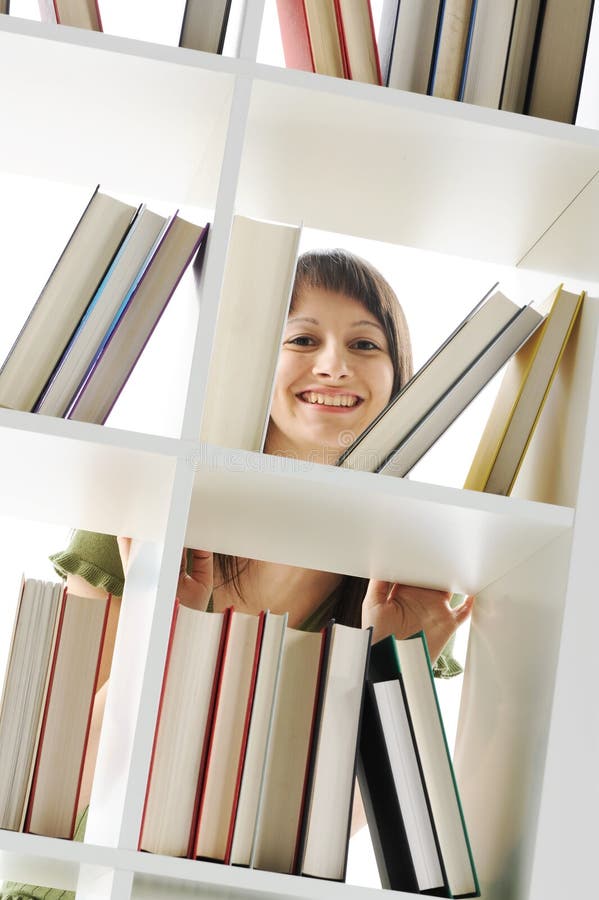 Young Woman Looking for a Book Stock Image - Image of attractive, cute ...
