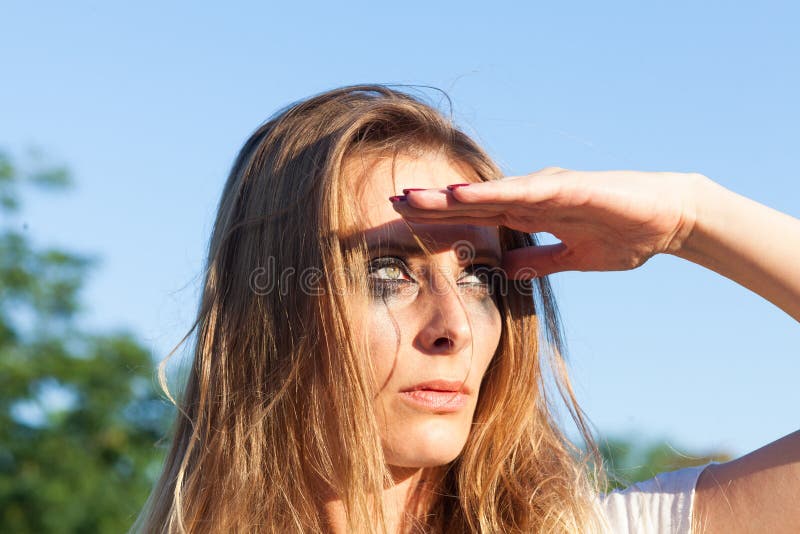 Young Woman Looking at Distance Stock Image - Image of saluting, heavy ...