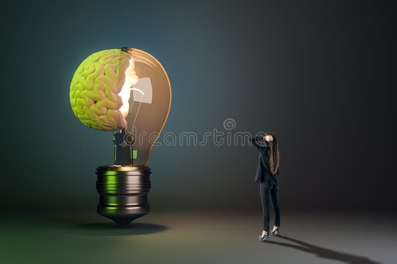 Young Woman Looking at Half Brain Half Light Bulb in Concrete Interior ...