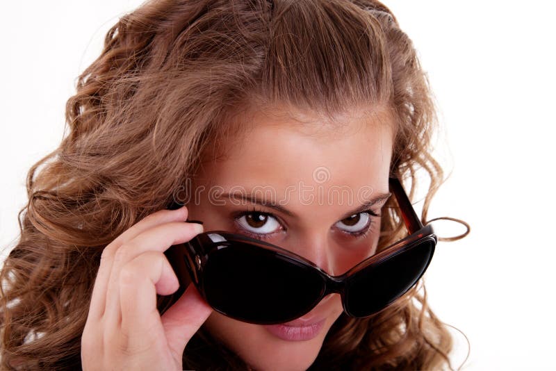 A Young Woman Looking Over Her Sunglasses Stock Image - Image of ...