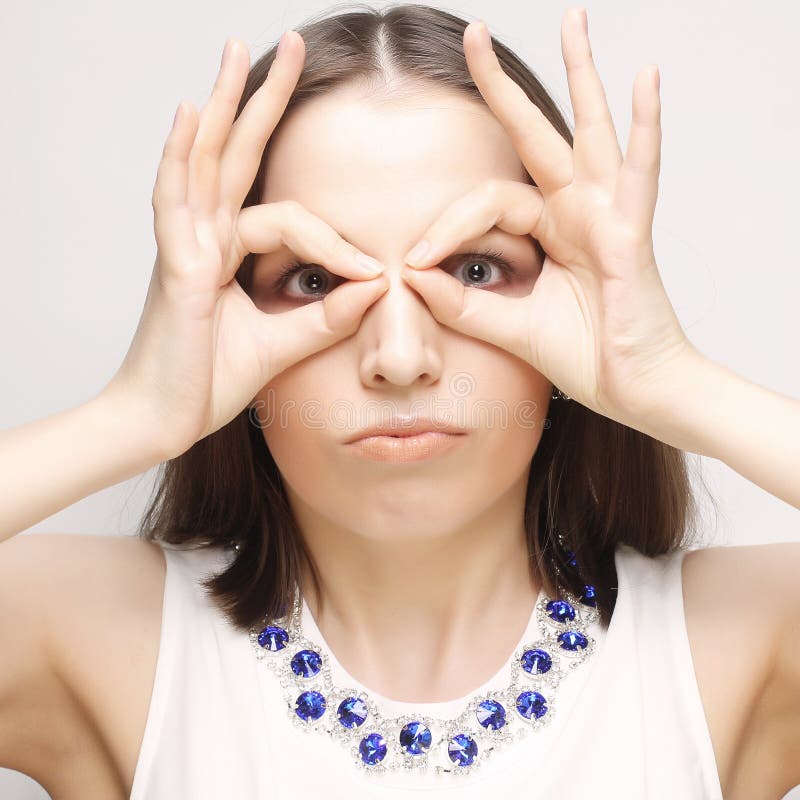 Young Woman Looking for Something with Wide Open Eyes and Imaginary ...