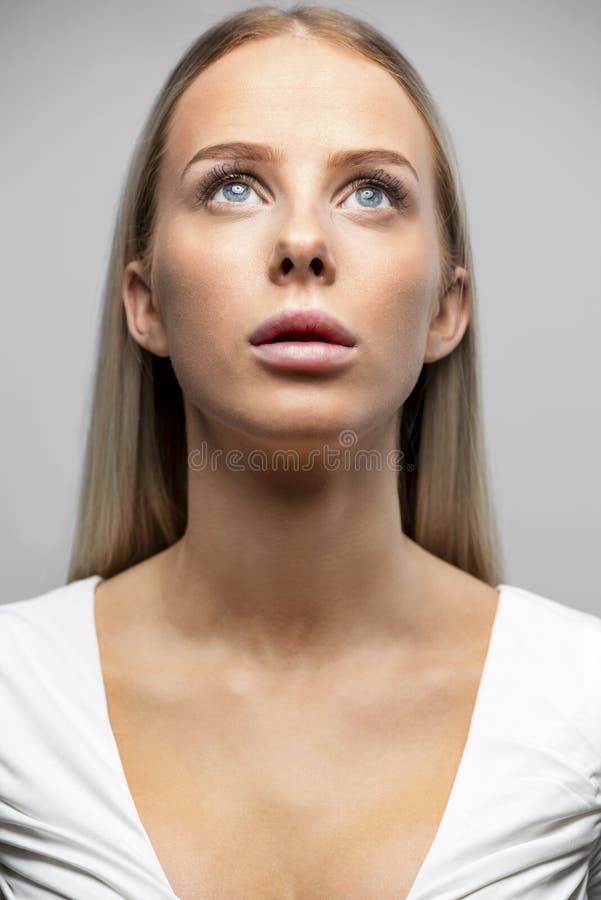 Young Woman Looking Up in the Sky Stock Image - Image of look, blond ...