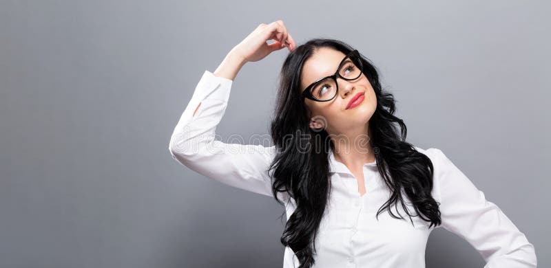 Young woman looking upward stock photo. Image of gray - 105329736