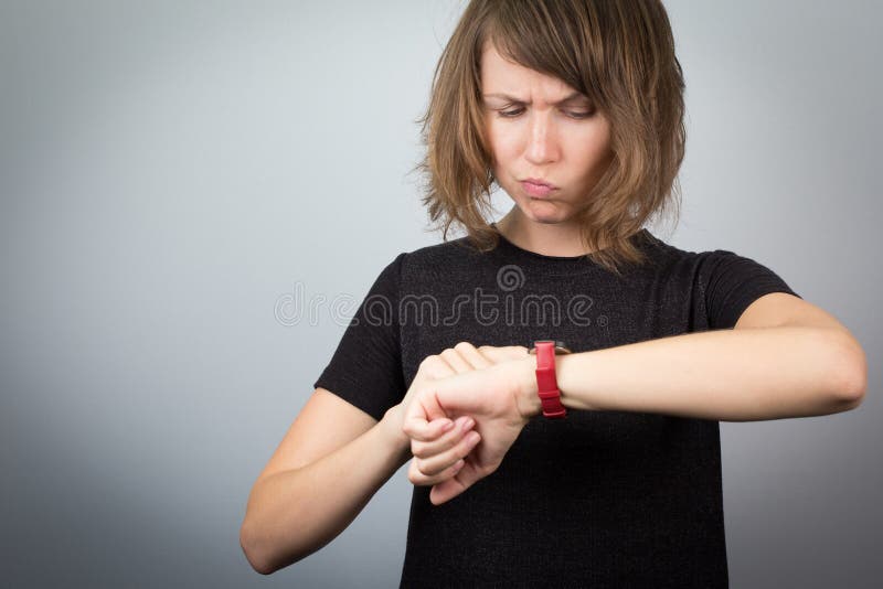 Young Woman Looking at Watch Time Waitnig. Stock Photo - Image of ...