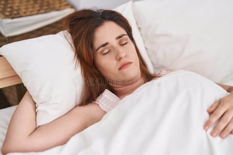 Young Woman Lying on Bed Sleeping at Bedroom Stock Image - Image of ...