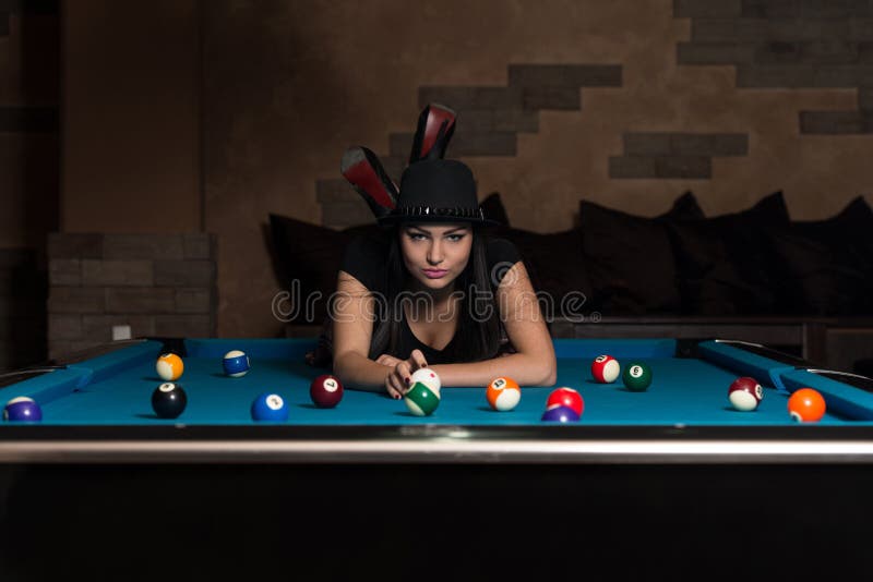Young Woman Lying on the Billiard Table Stock Photo - Image of ...