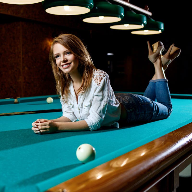 Young Woman Lying on the Green Billiard Table. Stock Image - Image of ...