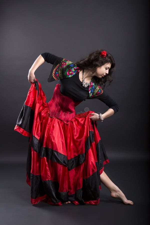 Young Woman Make Step in Spanish Traditional Clothes Stock Photo ...
