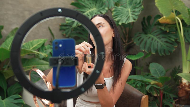 Young Woman Making Beauty and Cosmetic Tutorial Video Content. Blithe ...