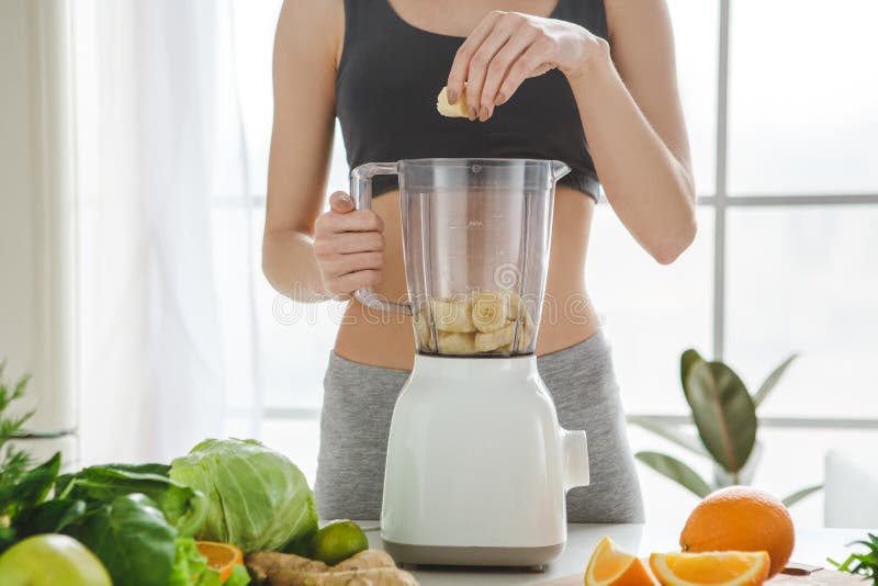 Young Woman Making Detox Smoothie at Home Stock Photo - Image of girl ...
