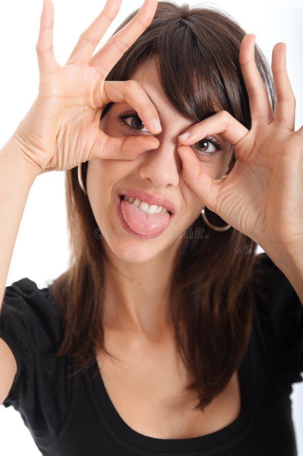 Young woman making a face stock photo. Image of playful - 24728404