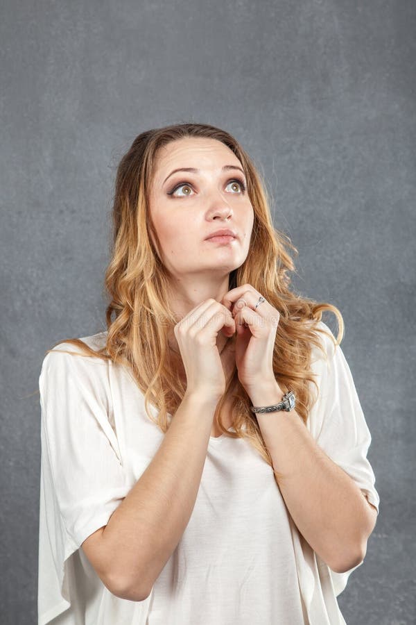 Young Woman Making Faces in Studio Stock Image - Image of facial ...