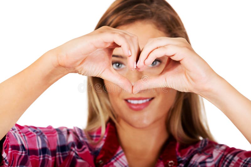 Young Woman Making a Heart Hand Gesture Stock Photo - Image of happy ...