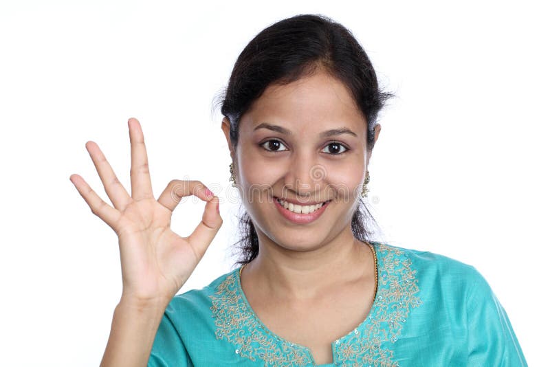 Young woman making OK sign stock photo. Image of indian - 20965222