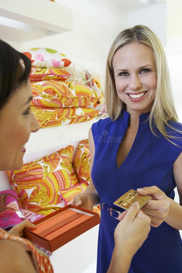Young Woman Making a Purchase Stock Image - Image of convenience ...