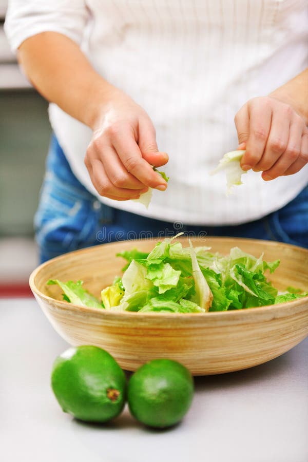 Young woman making salad stock photo. Image of meal, healthy - 49302508