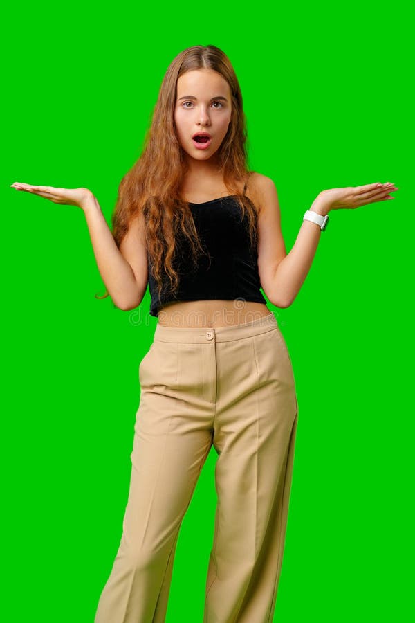 Young Woman Making a Surprised Face in Front of Green Screen Stock ...