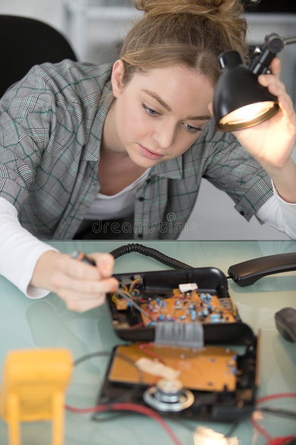 Young Woman with Measuring Devices in Electronics Engineer Laboratory ...