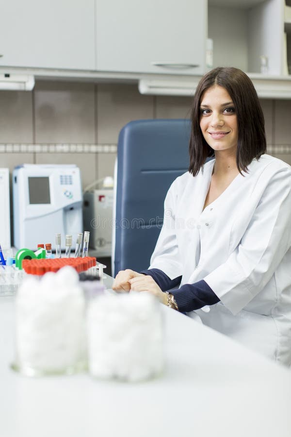 Young Woman Doing Blood Sampling in Modern Medical Laboratory Stock ...