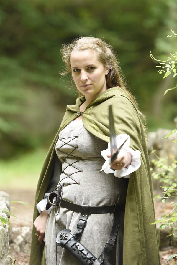 Young Woman in Medieval Attire Stock Image - Image of wood, holding ...