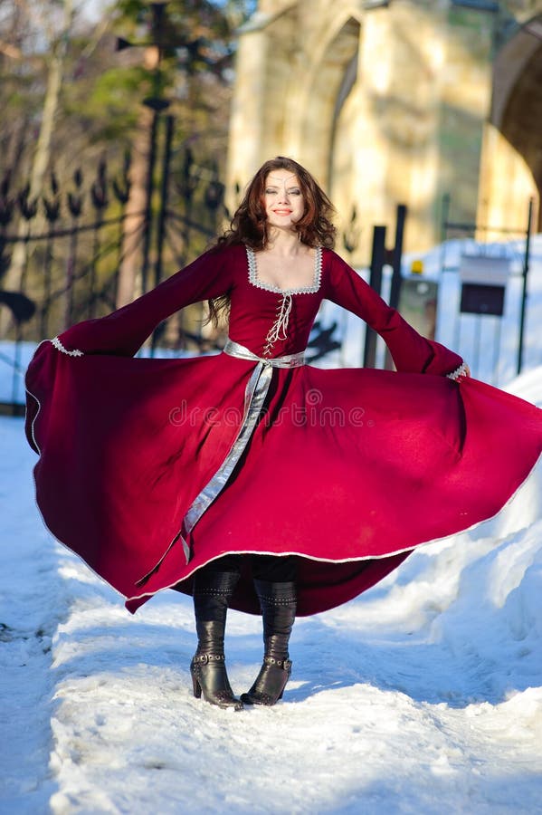 The Young Woman in a Medieval Dress Stock Photo - Image of garden ...