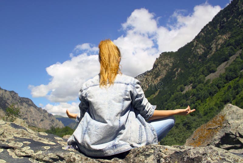 Young Woman Meditating on Top of a Mountain Stock Image - Image of tree ...