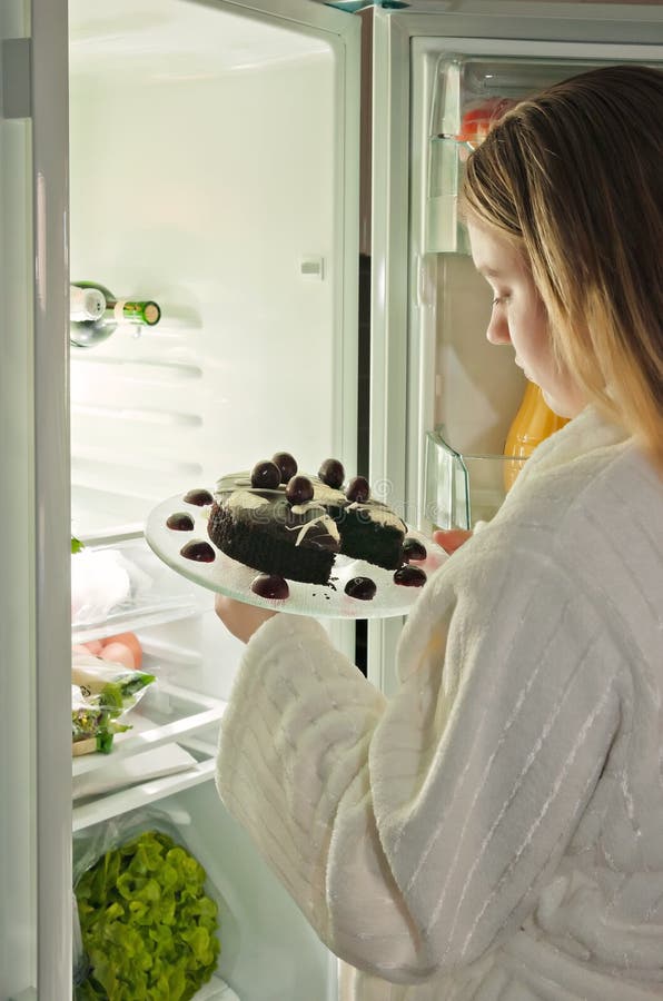 Young woman midnight snack stock photo. Image of woman - 23251160